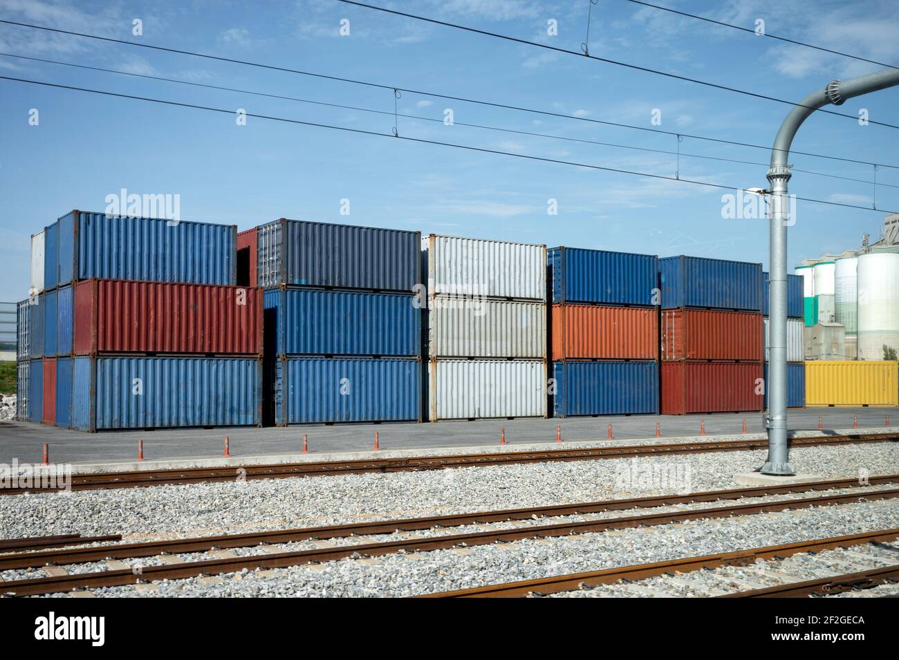 Stacked of container cargo with rainway in container terminal. Business ...