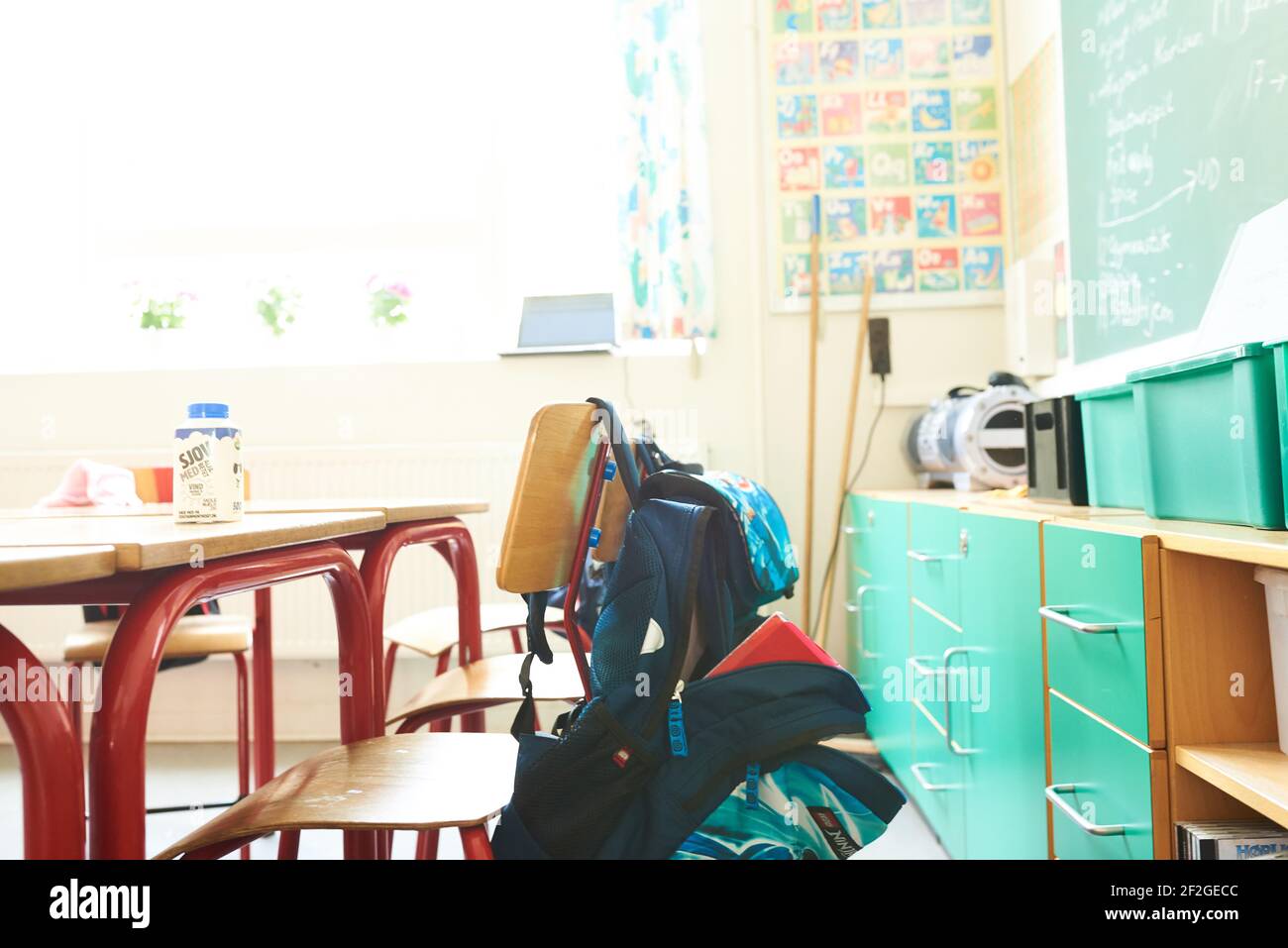 A colorful classroom with seating for elementary students Stock Photo ...