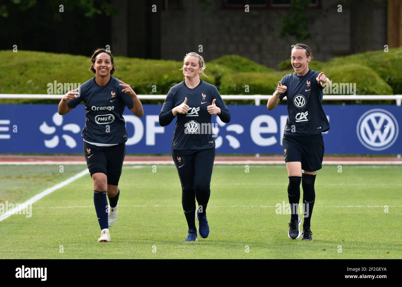 Sarah Bouhaddi, Solene Durand and Pauline Peyraud Magnin are smiling ...