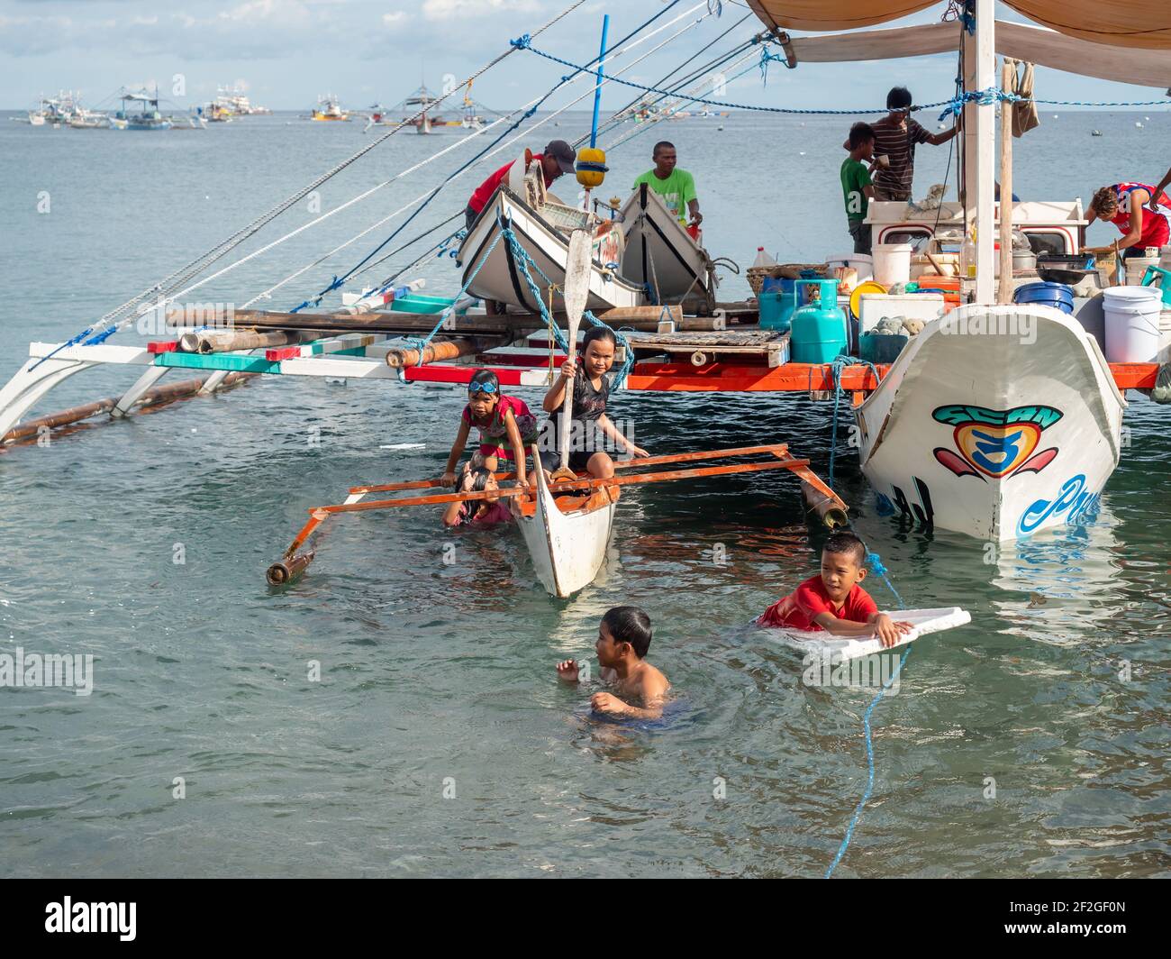 Asian boy fishing boat hi-res stock photography and images - Alamy