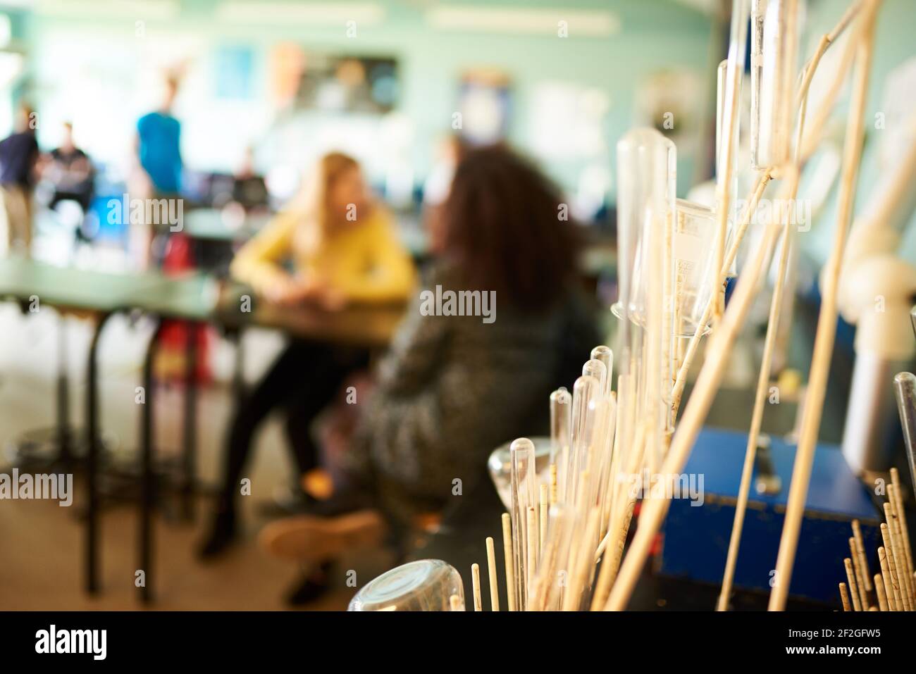 A physics classroom with students working at their table Stock Photo ...