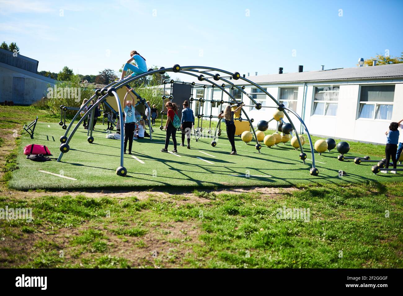 Children playing at the playground during break Stock Photo - Alamy