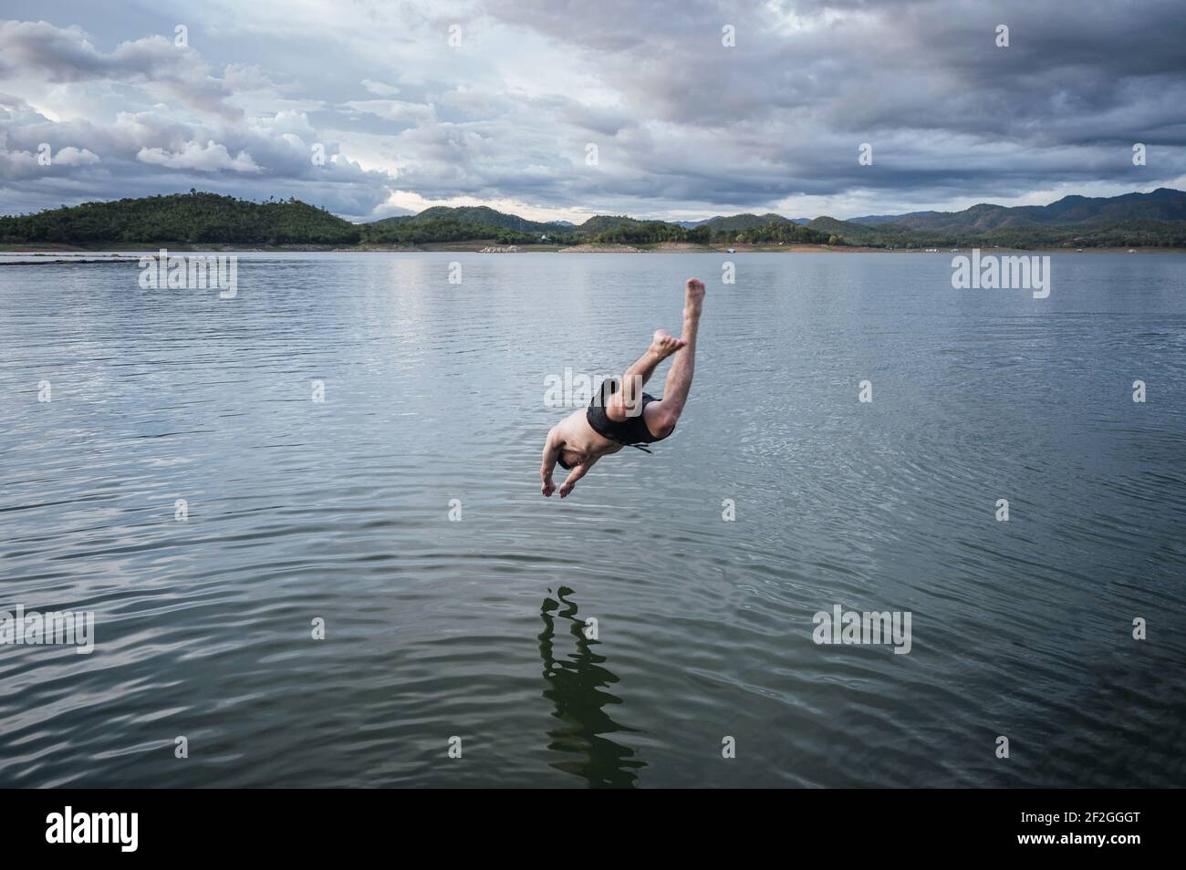 Tourist man jump dive river hi-res stock photography and images - Alamy