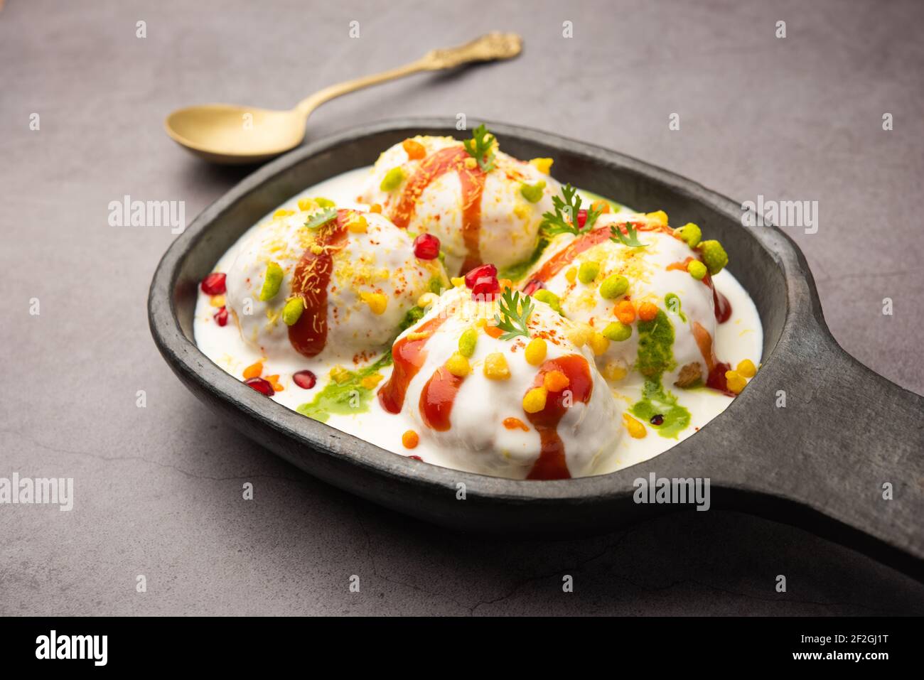 Dahi vada or bhalla is a type of chaat originating from the Indian and ...