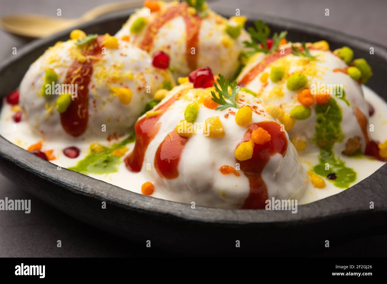 Dahi vada or bhalla is a type of chaat originating from the Indian and ...