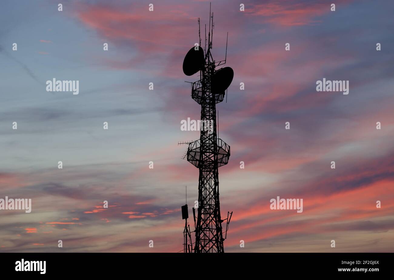 Communication transmitter against a sky background Stock Photo - Alamy