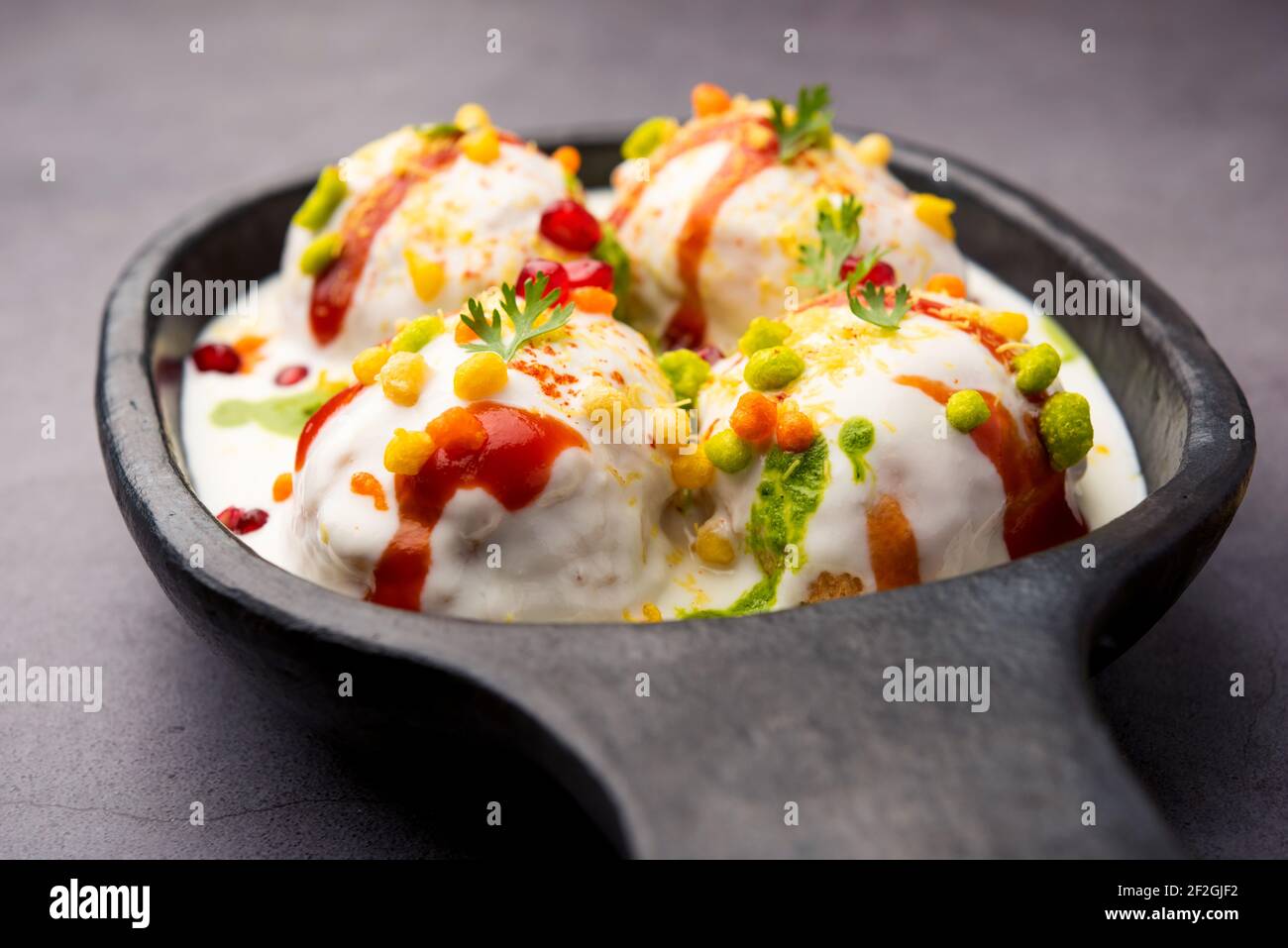 Dahi vada or bhalla is a type of chaat originating from the Indian and ...