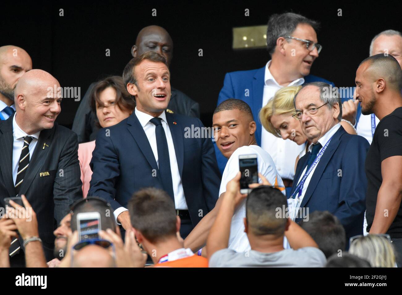 Emmanuel Macron, President of France, with soccer player Kylian Mbappe ...