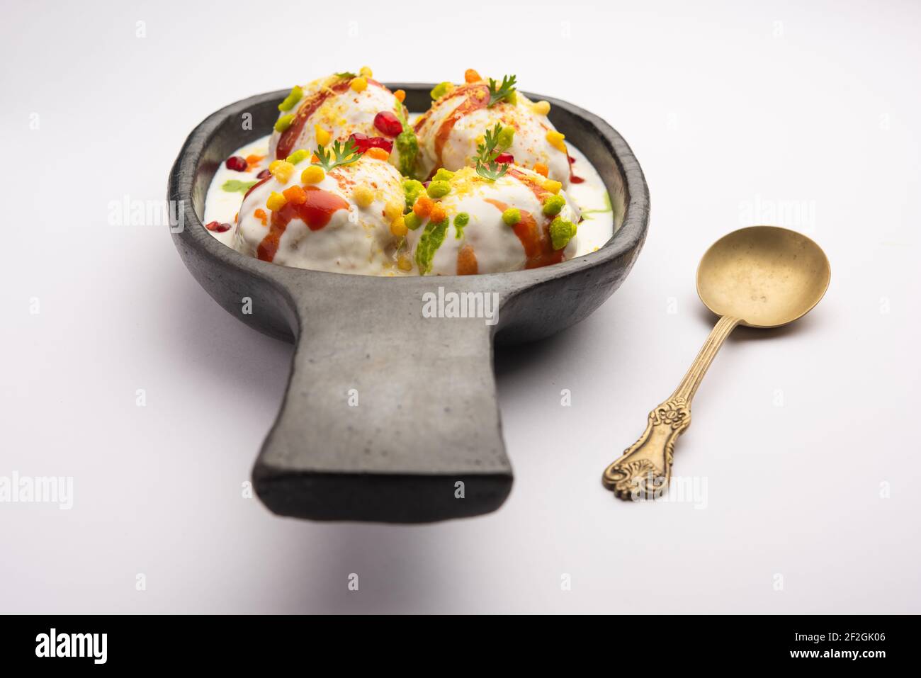 Dahi vada or bhalla is a type of chaat originating from the Indian and ...