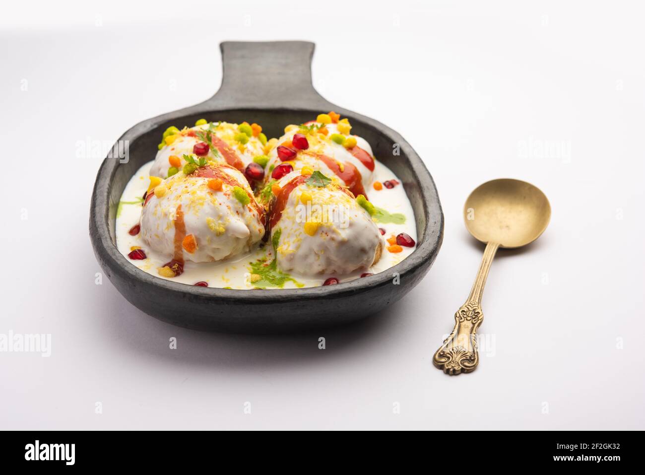 Dahi vada or bhalla is a type of chaat originating from the Indian and ...