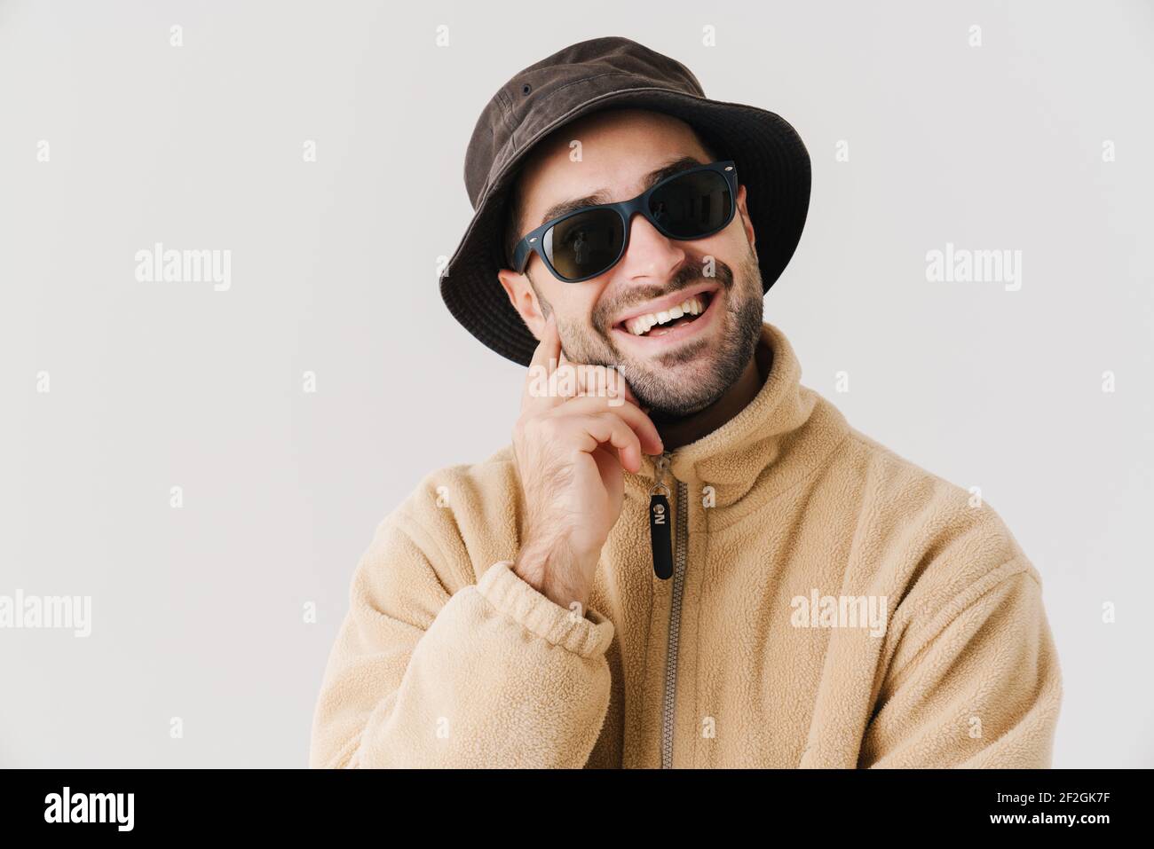 Man wearing beige hi-res stock photography and images - Alamy