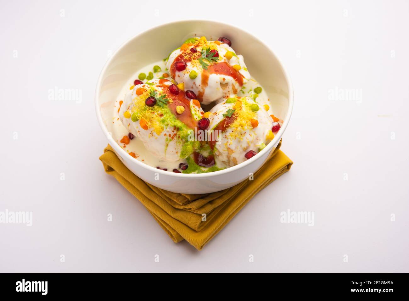 Dahi vada or bhalla is a type of chaat originating from the Indian and ...