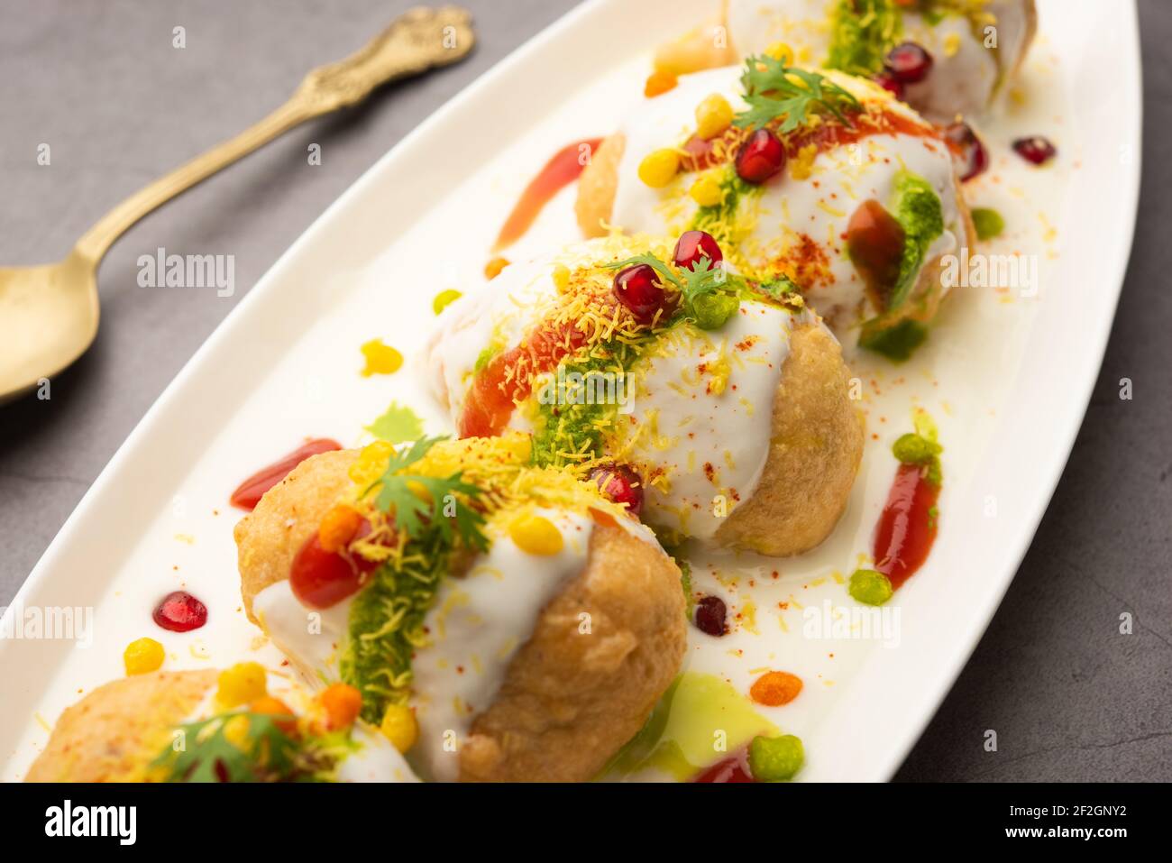 Dahi vada or bhalla is a type of chaat originating from the Indian and ...