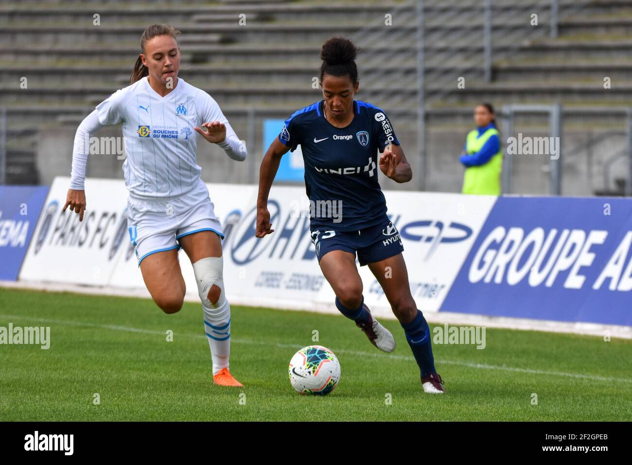 Maud Antoine of Olympique de Marseille and Eseosa Aigbogun of Paris FC ...