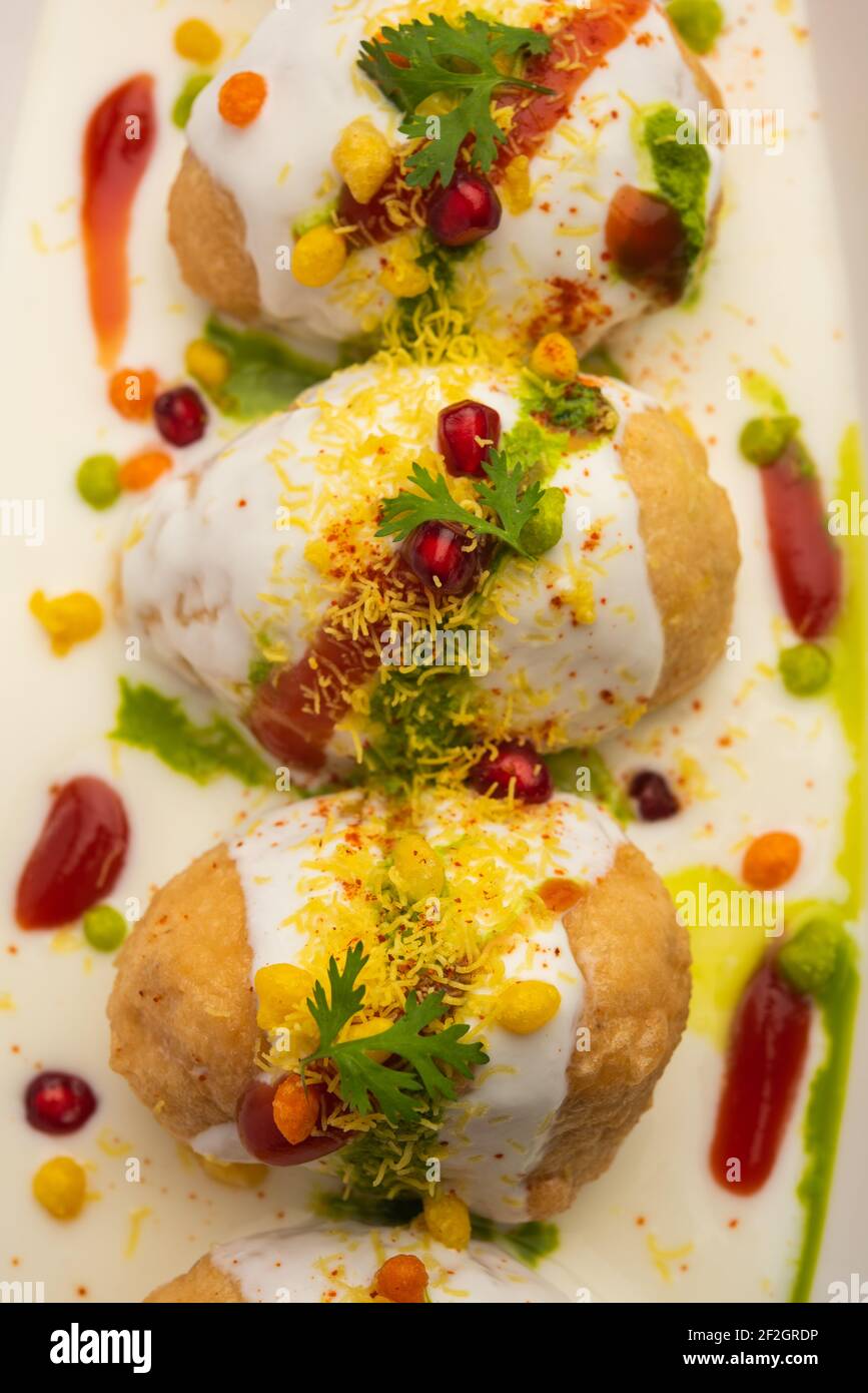 Dahi vada or bhalla is a type of chaat originating from the Indian and ...