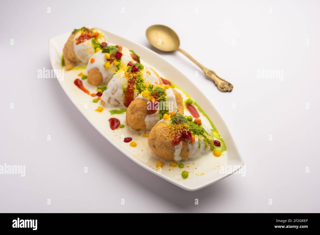 Dahi vada or bhalla is a type of chaat originating from the Indian and ...