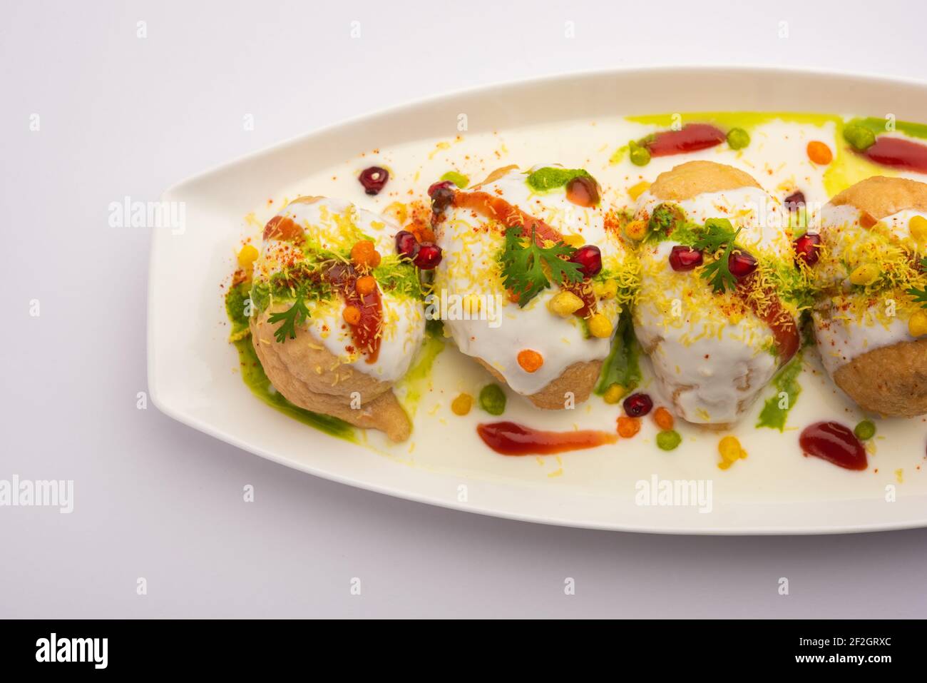 Dahi vada or bhalla is a type of chaat originating from the Indian and ...
