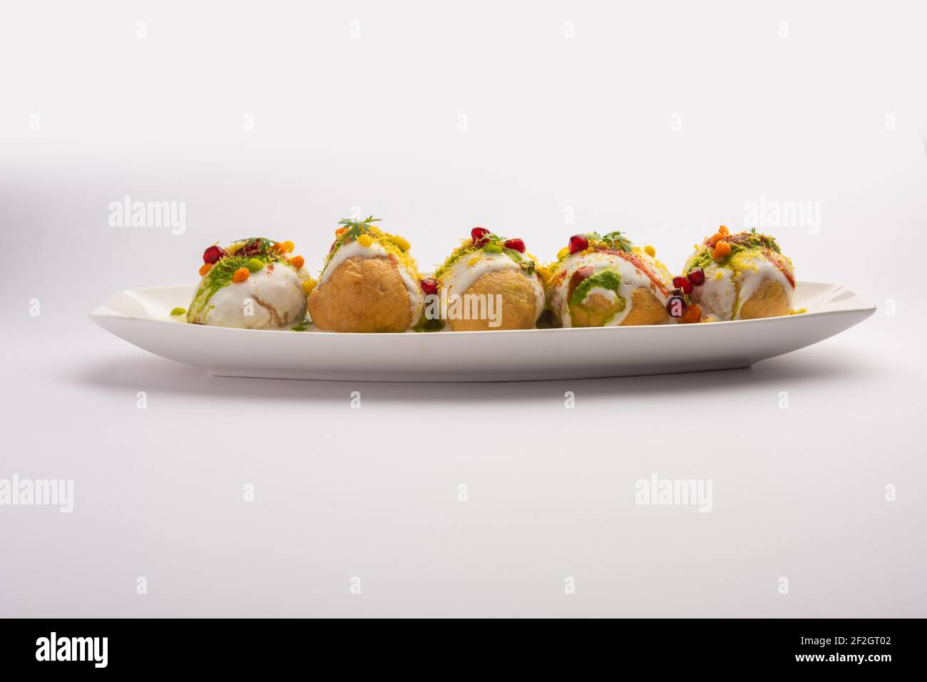 Dahi vada or bhalla is a type of chaat originating from the Indian and ...
