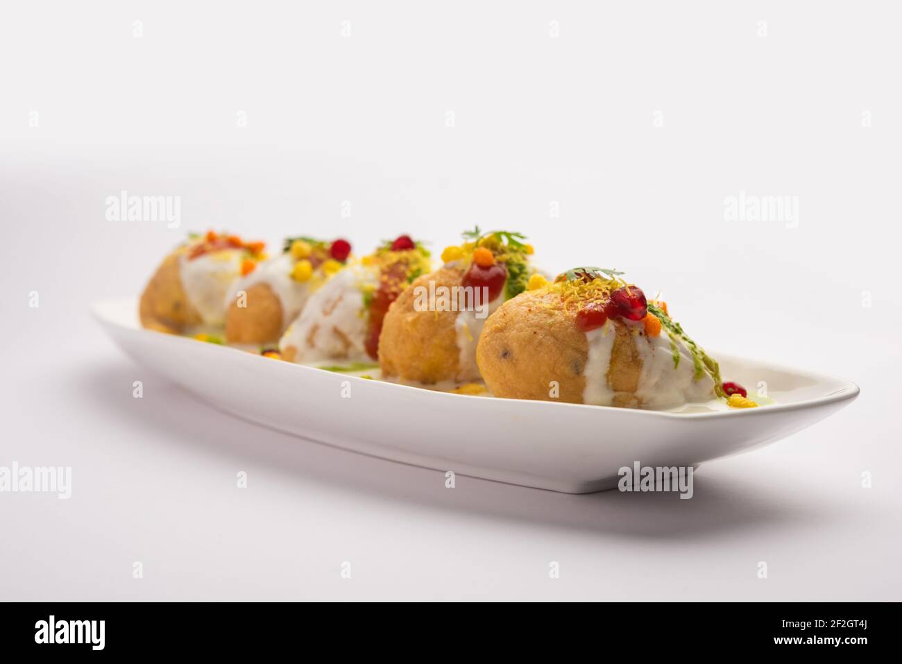 Dahi vada or bhalla is a type of chaat originating from the Indian and ...