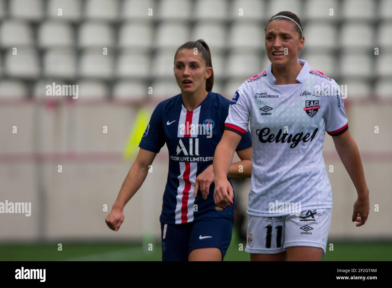 Eve Perisset of Paris Saint Germain and Louise Fleury of EA Guingamp ...
