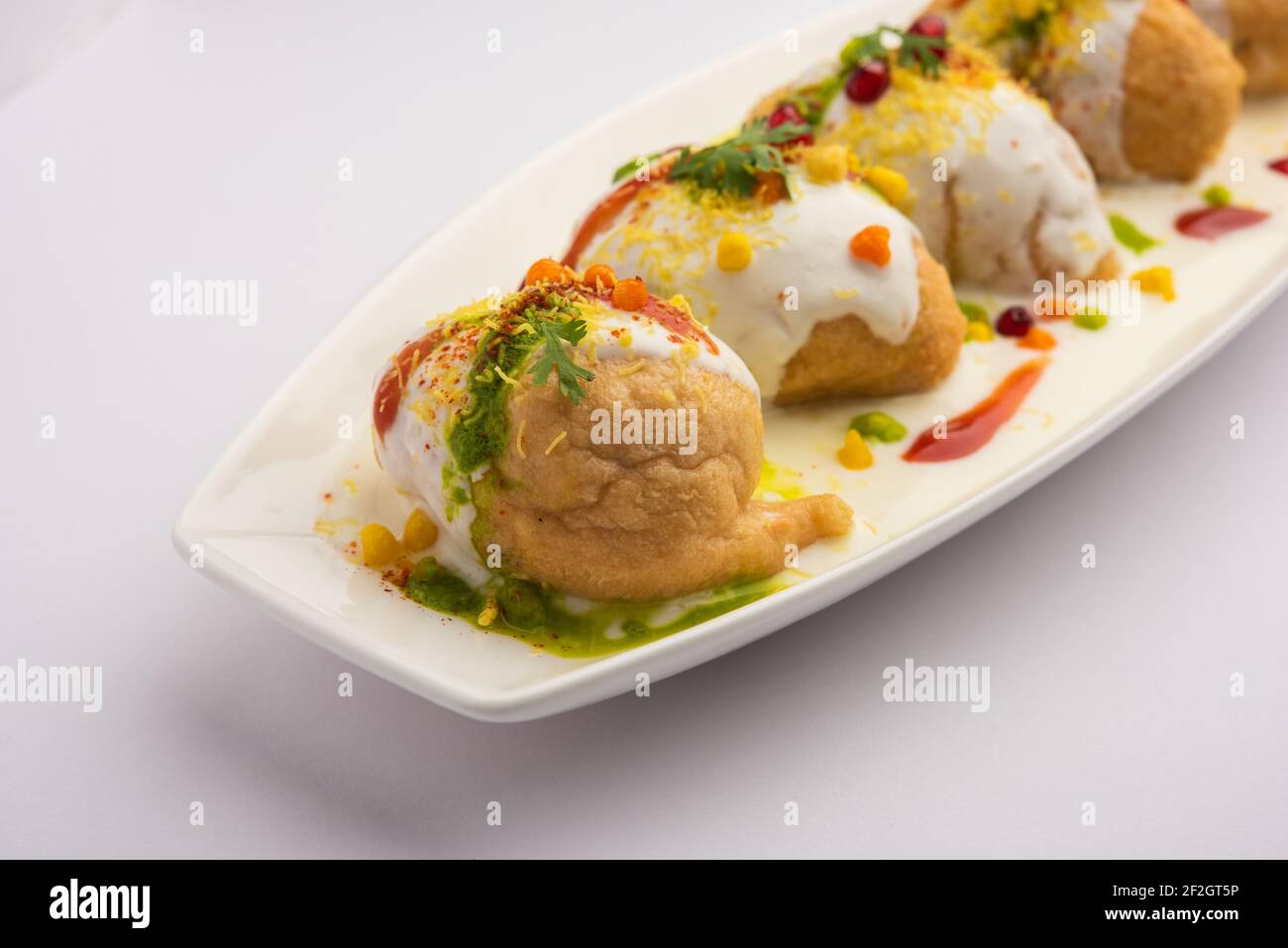 Dahi vada or bhalla is a type of chaat originating from the Indian and ...