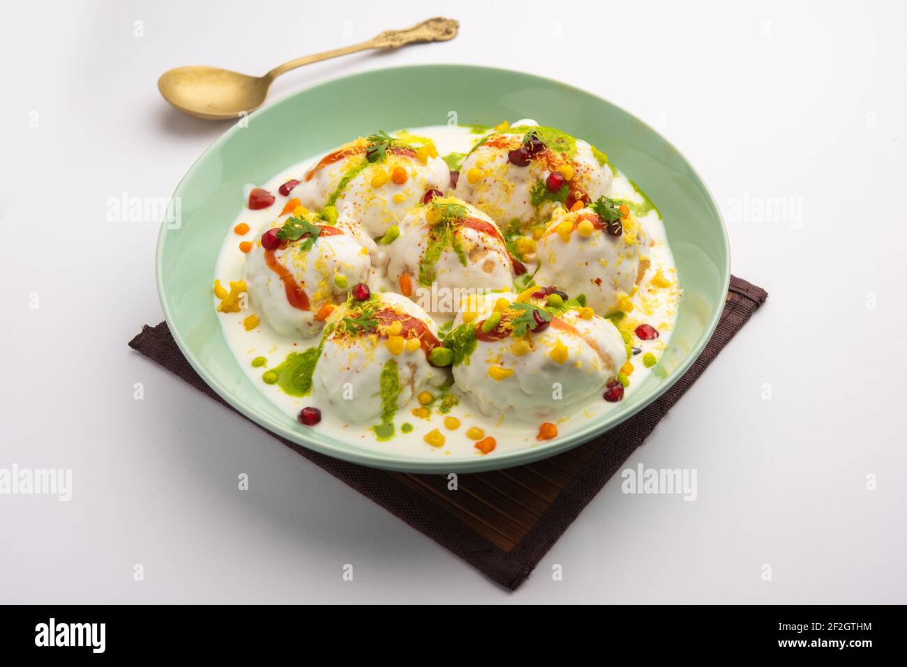 Dahi vada or bhalla is a type of chaat originating from the Indian and ...