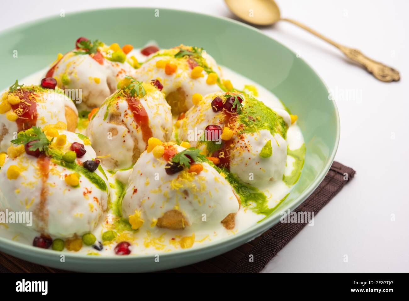 Dahi vada or bhalla is a type of chaat originating from the Indian and ...