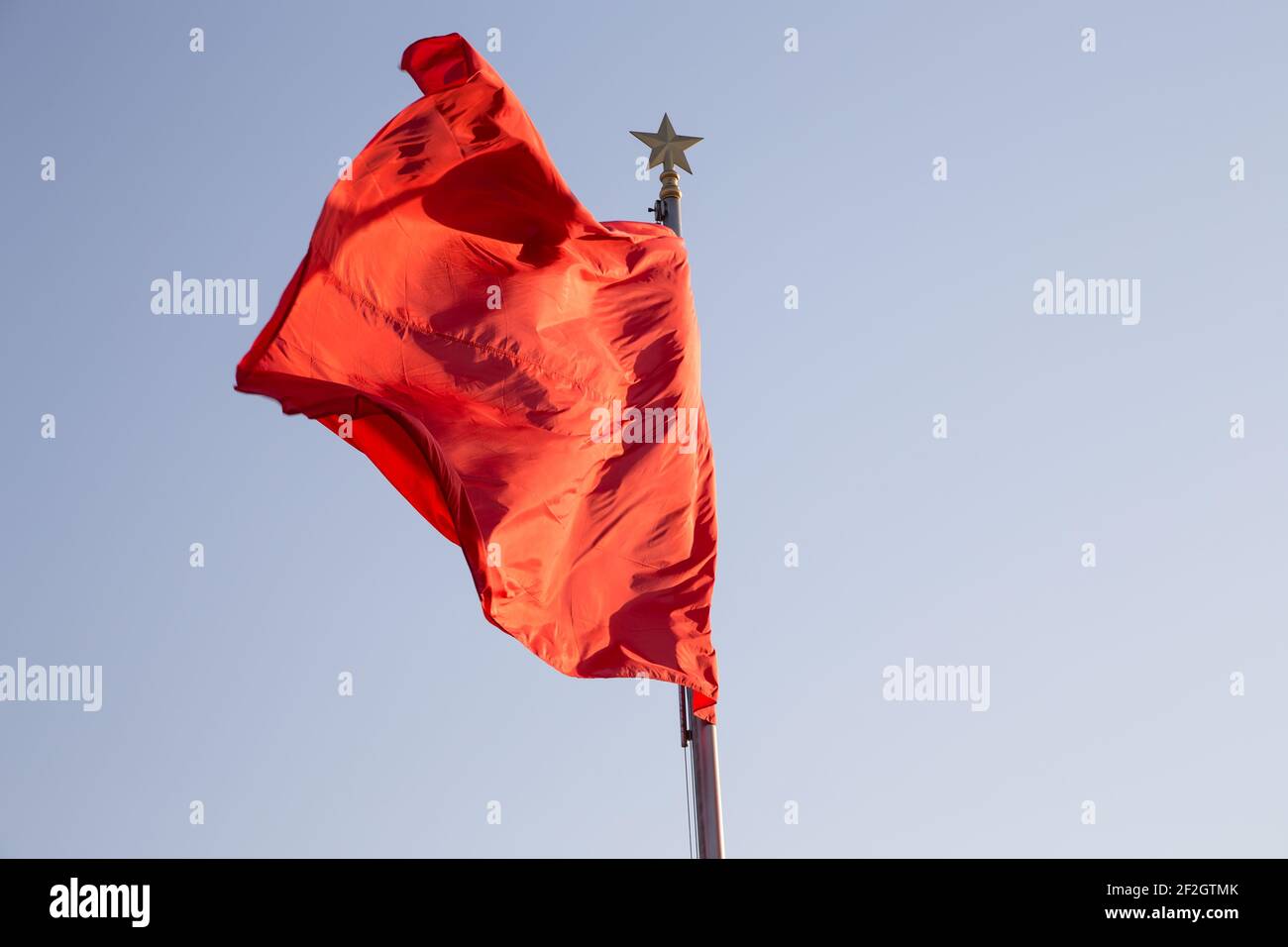 Red flags on the Tiananmen Square -- is a large city square in the ...