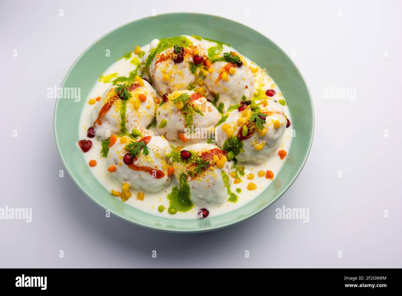Dahi vada or bhalla is a type of chaat originating from the Indian and ...