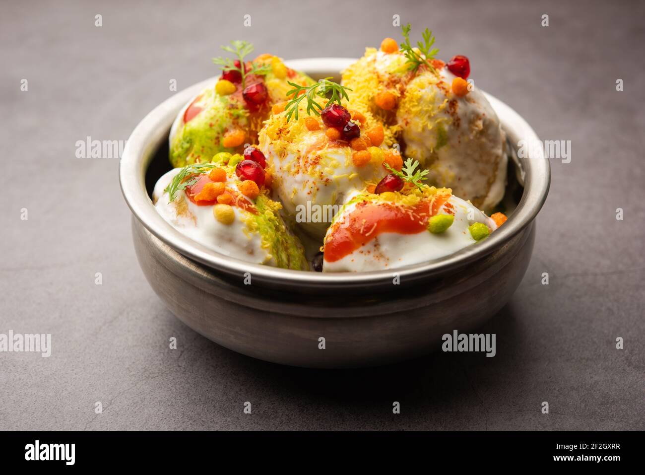 Dahi vada or bhalla is a type of chaat originating from the Indian and ...