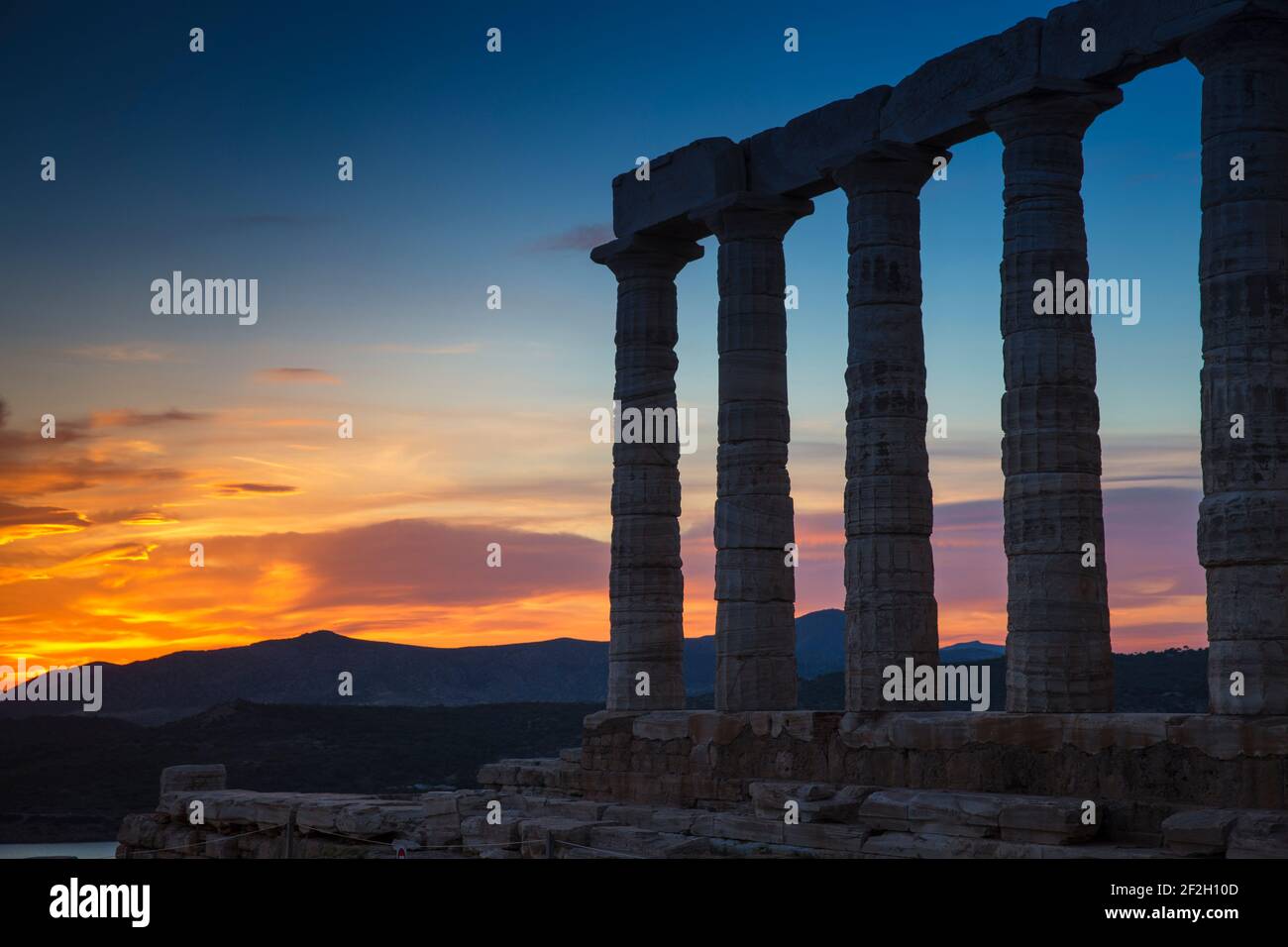 Greece, Attica, Athens, Cape Sounio, Temple of Poseidon at sunset Stock ...