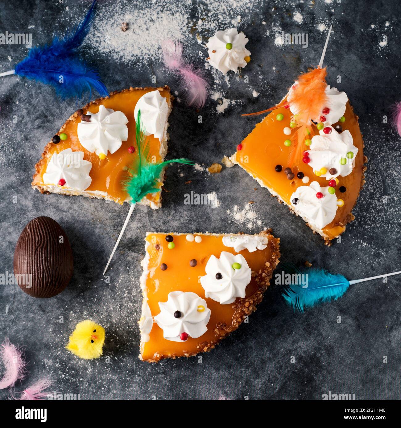 high angle view of some pieces of a spanish mona de pascua, a cake ...
