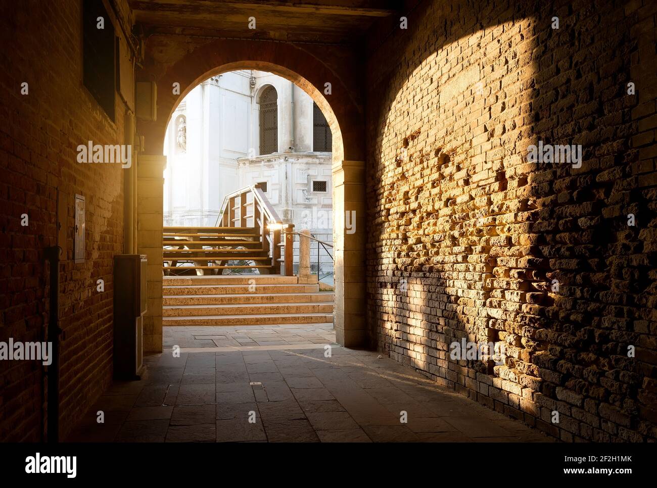 Arch and old brick walls in Venice, Italy Stock Photo - Alamy