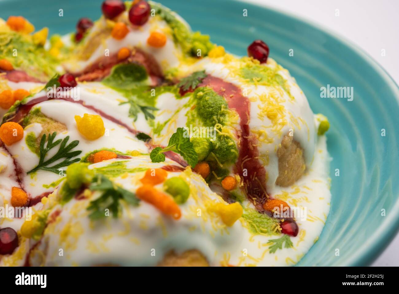 Dahi vada or bhalla is a type of chaat originating from the Indian and ...