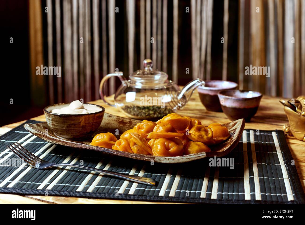 Dim sum and tea set on the table in the restaurant Stock Photo - Alamy