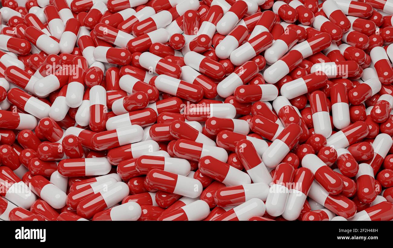 Red and white capsules production. Pharmaceutical and medicine business ...