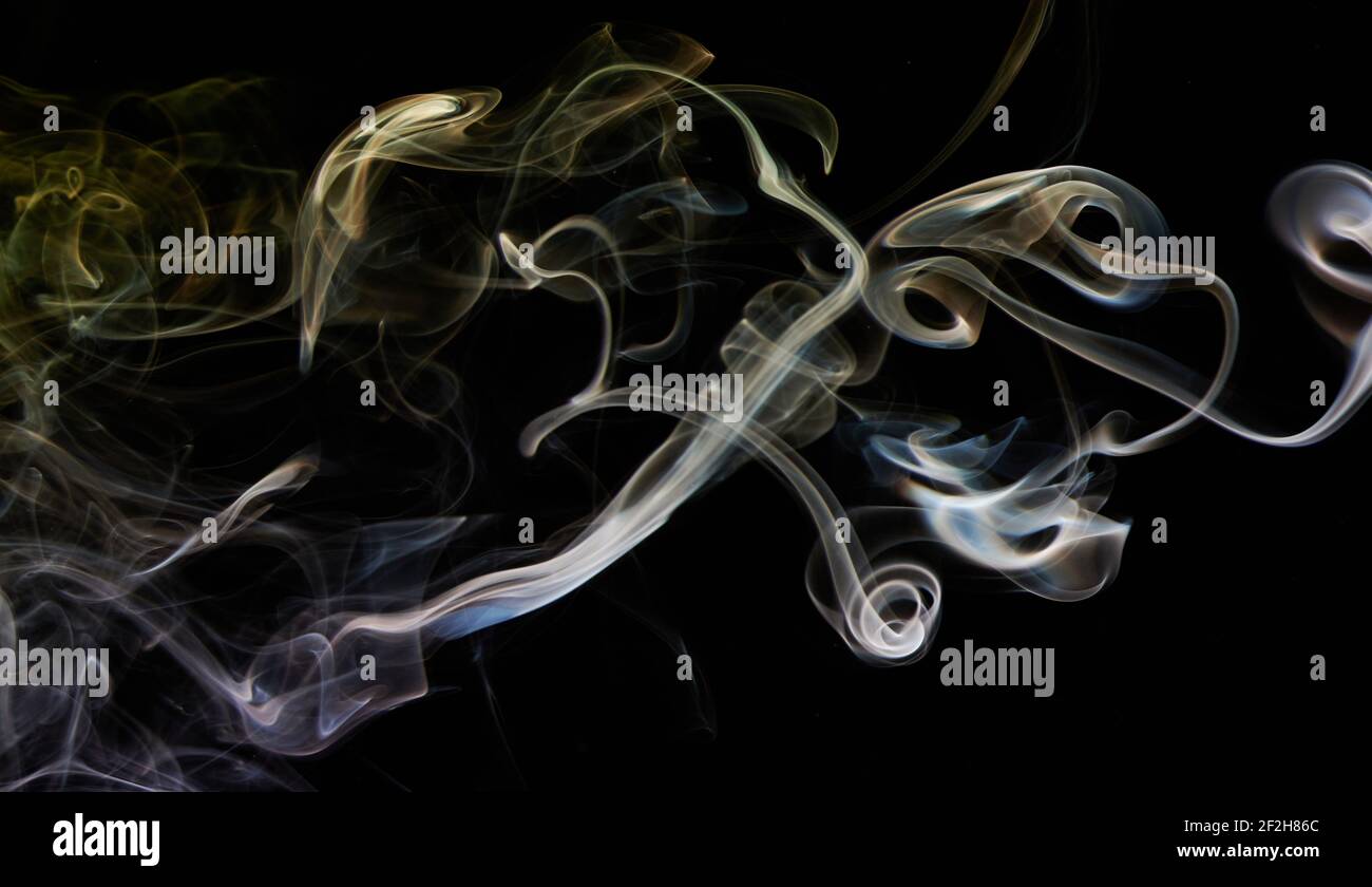 Abstract colorful smoke lines with smooth shape in black backdrop Stock ...