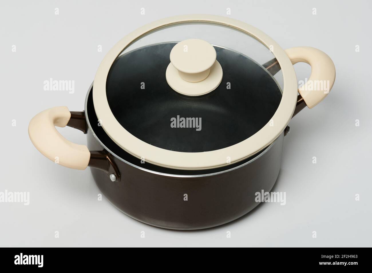 Brown cooking pot with cover isolated on white background Stock Photo ...