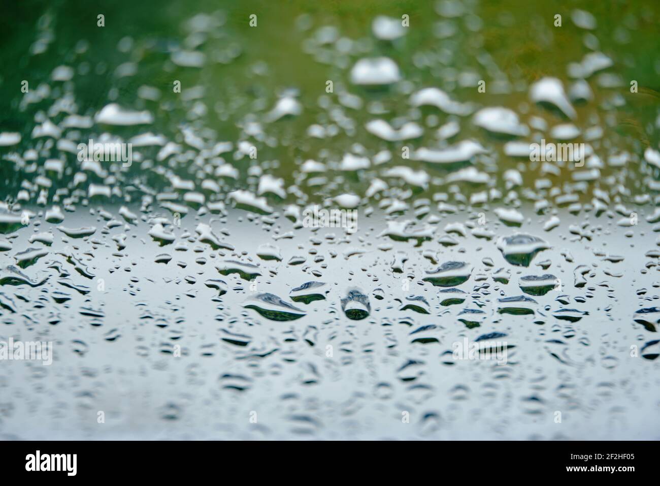 water drops on window glass closeup image Stock Photo - Alamy