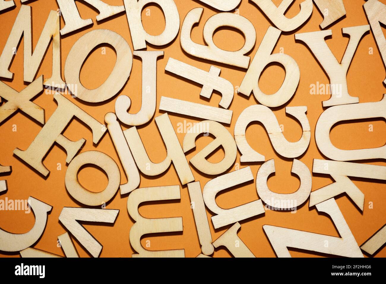 Wood letters on a table Stock Photo - Alamy