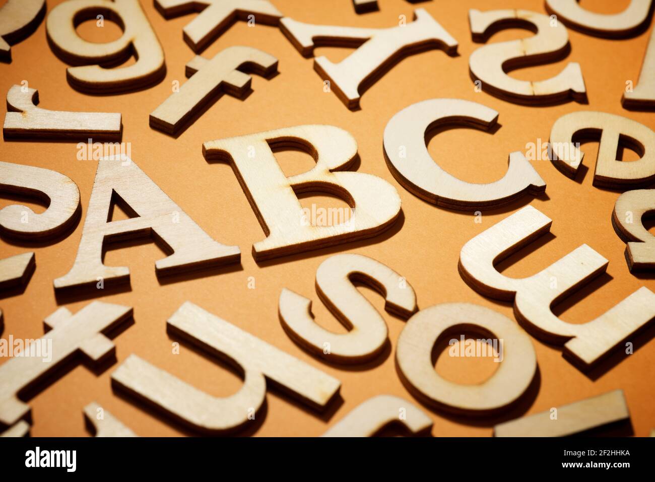 Wood letters on a table Stock Photo - Alamy