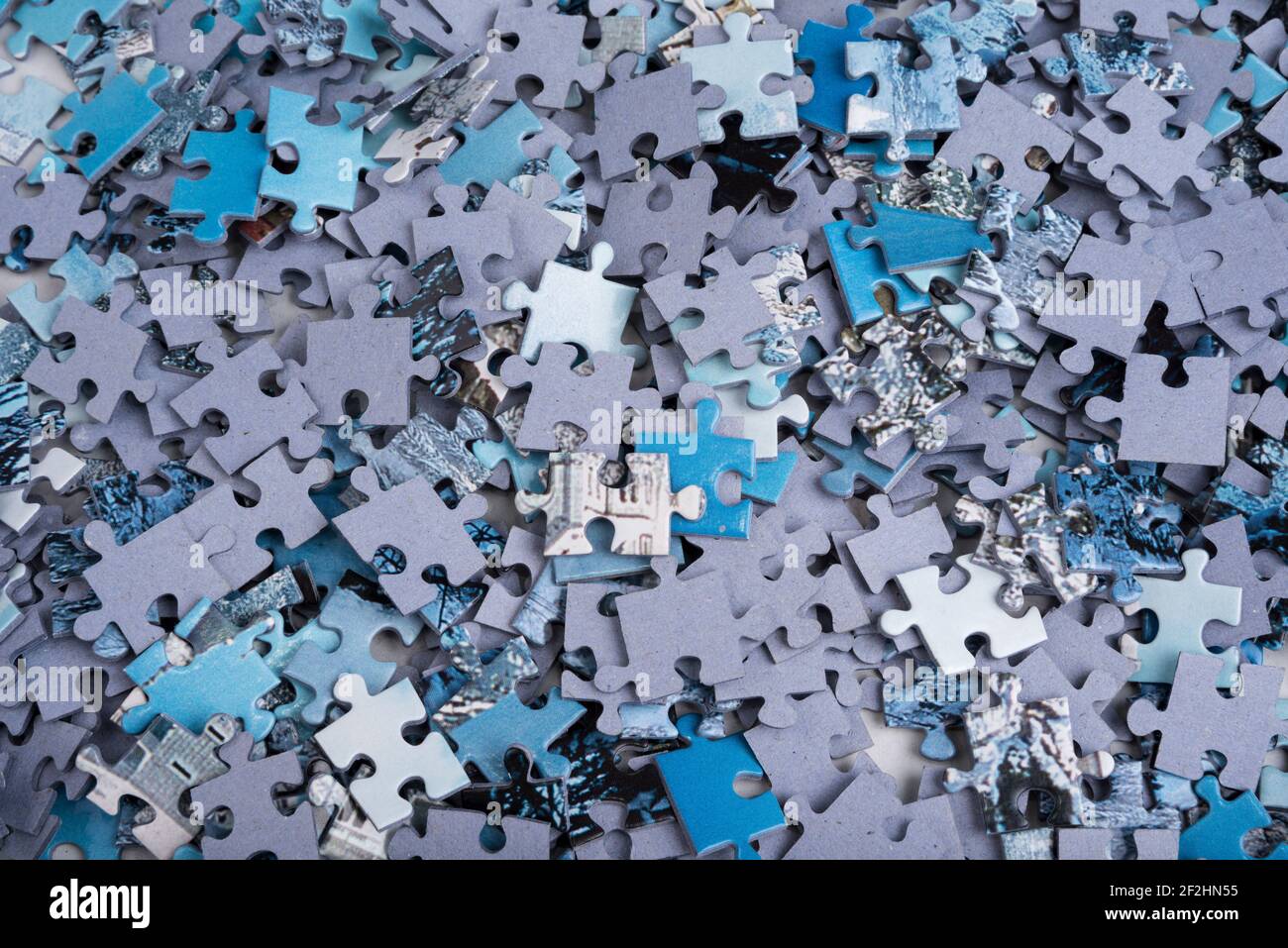 Puzzles on a white background. Solution and teamwork concept Stock ...