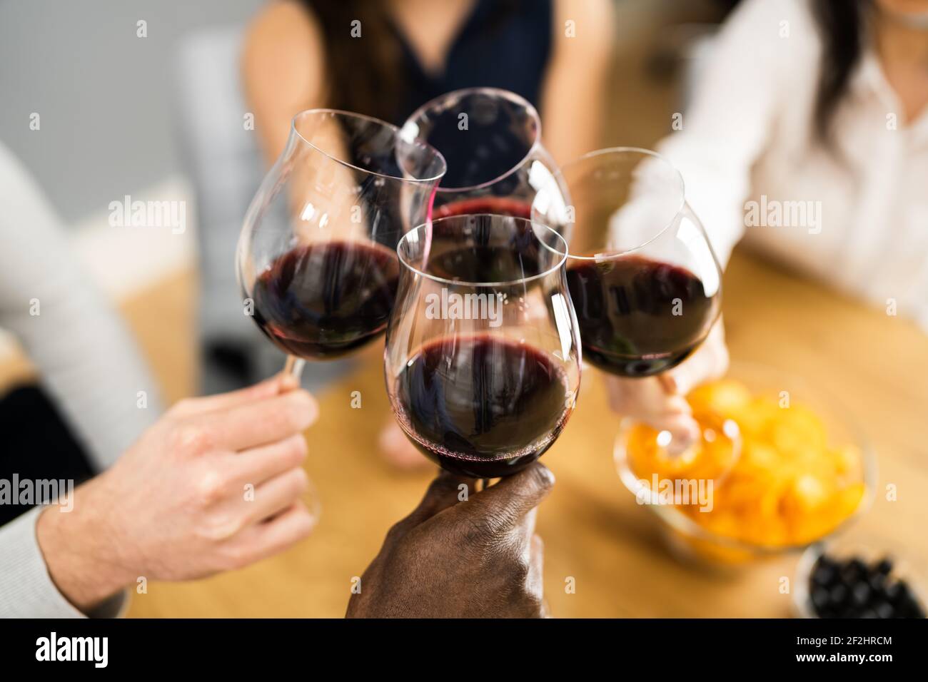 Fun People Food Party. Friends Having Dinner Stock Photo - Alamy