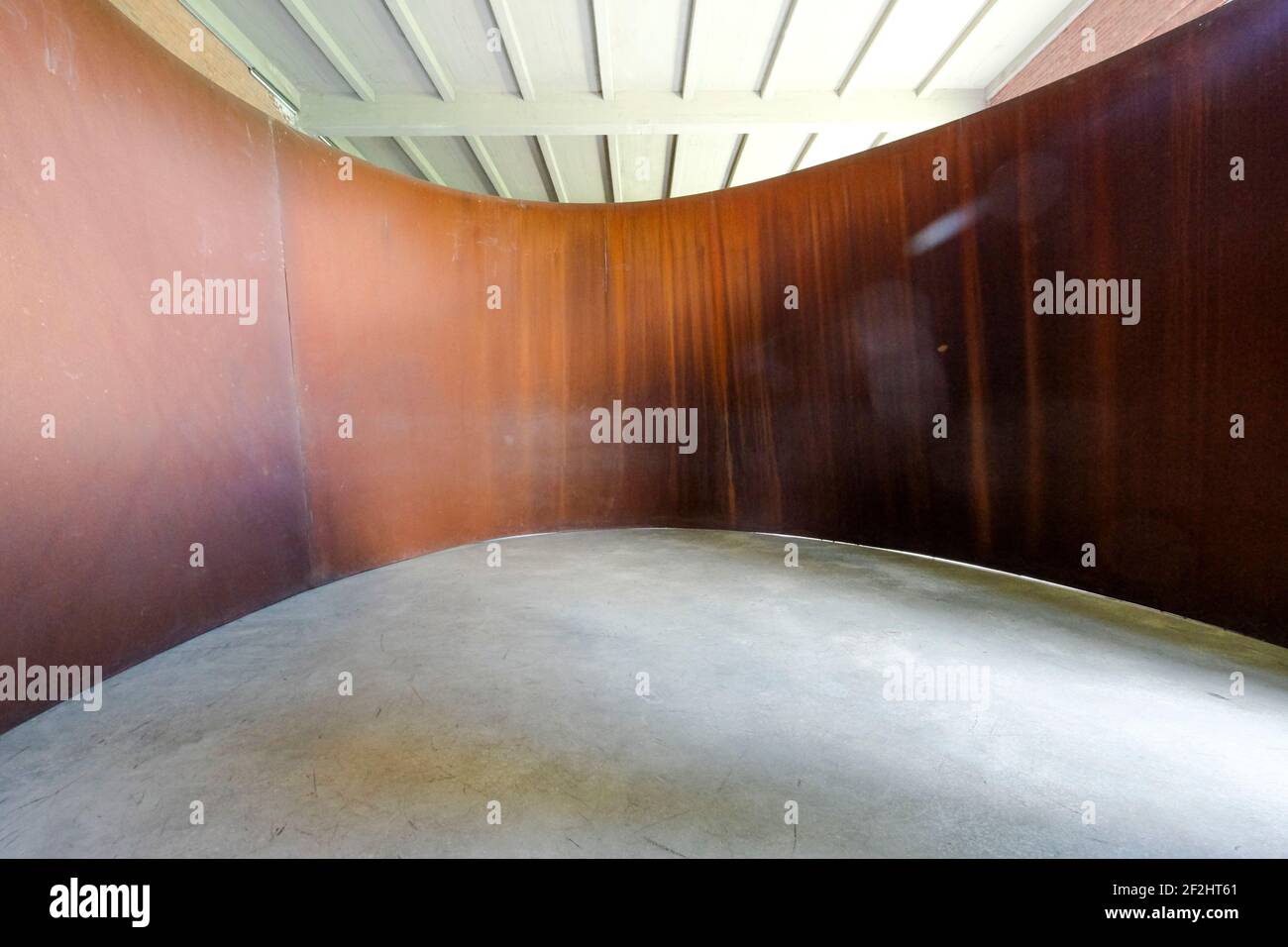 A view of sculptor Richard Serra's rusted steel Torqued Ellipses. At ...