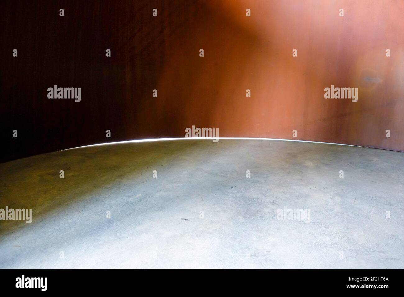 A view of sculptor Richard Serra's rusted steel Torqued Ellipses. At ...
