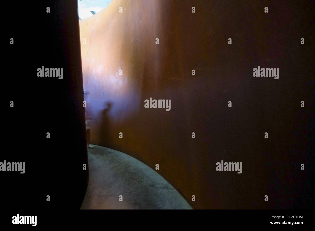 A view of sculptor Richard Serra's rusted steel Torqued Ellipses. At ...