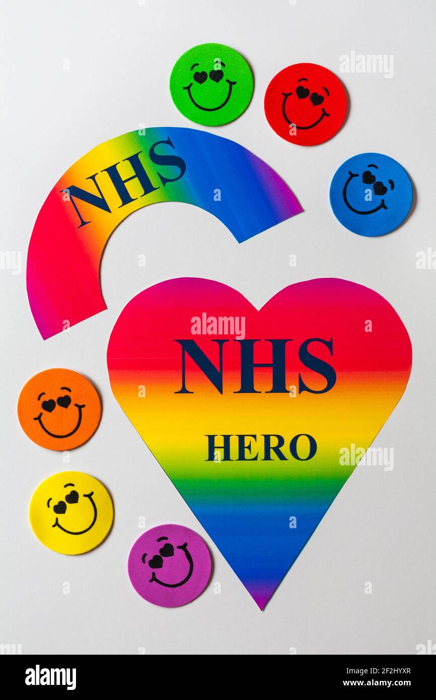 Colourful NHS hero heart and rainbow with smiley faces isolated on ...
