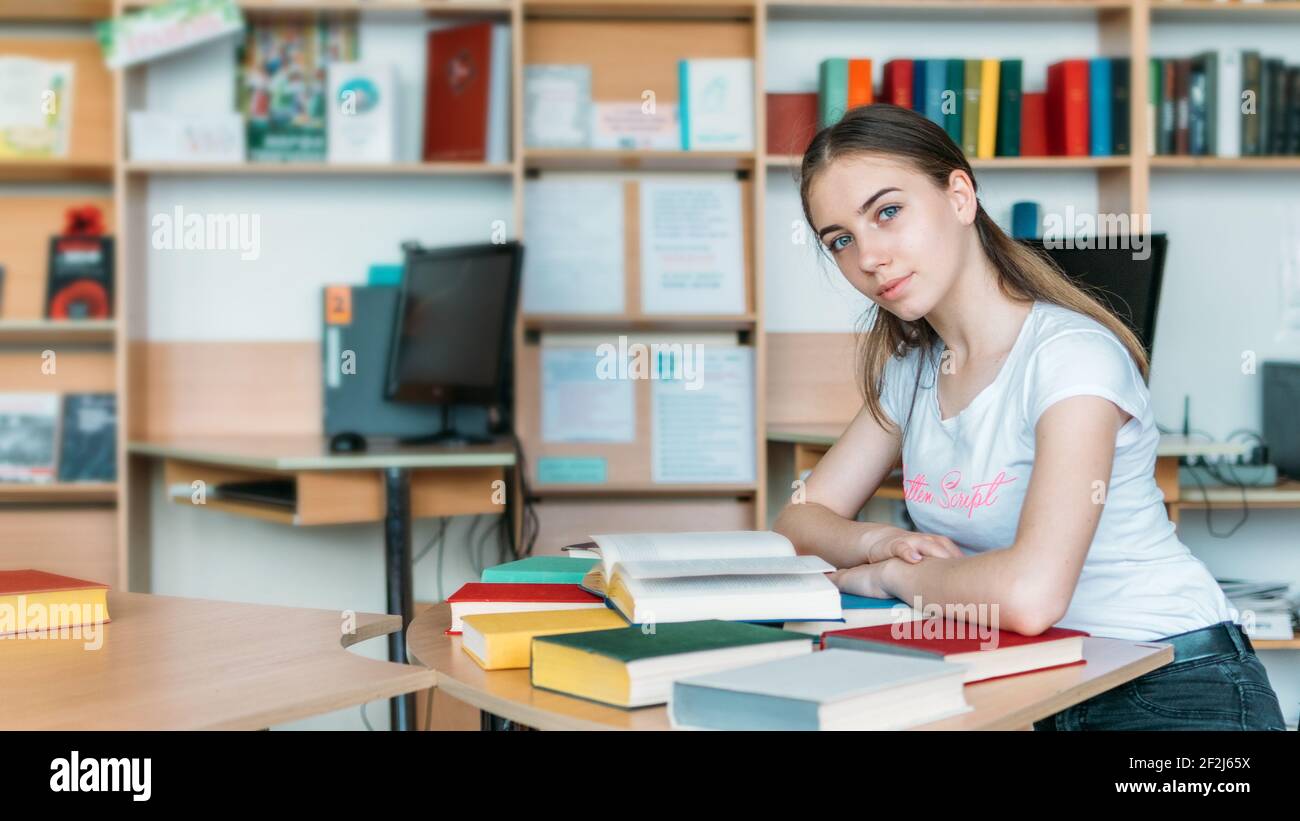 Back to school, reading book, education, library concept. Student girl ...