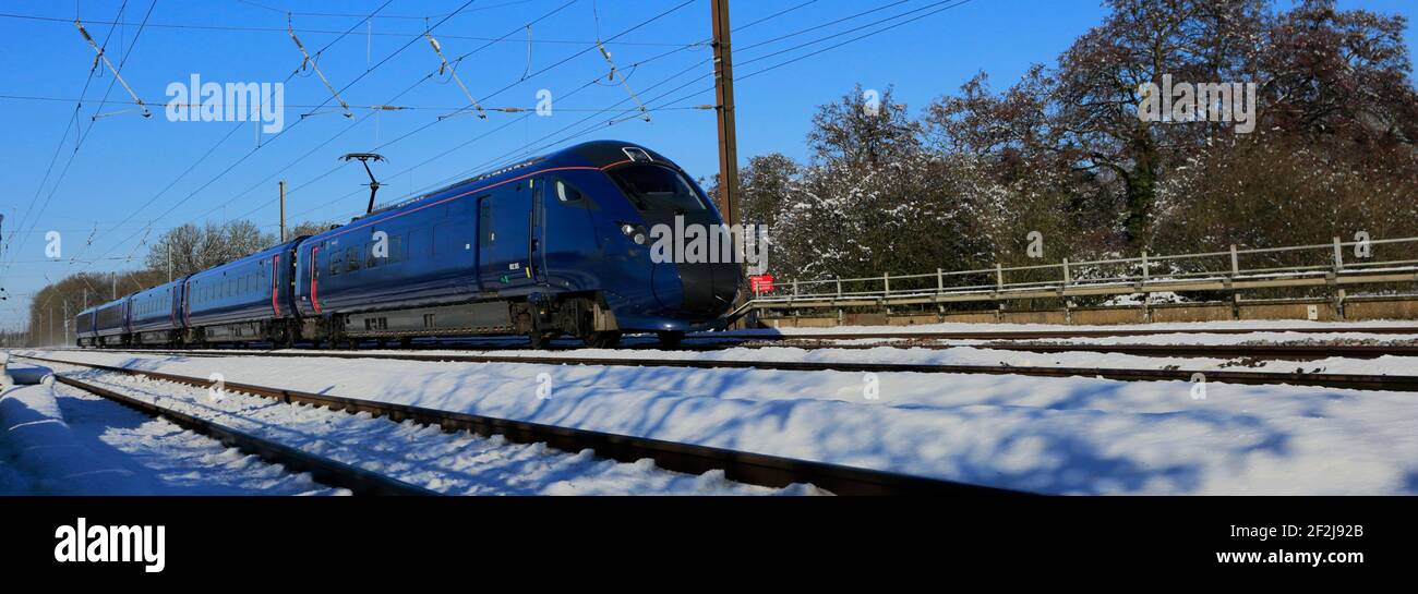 Class 802, Hull Trains Azuma train in snow, East Coast Main Line ...