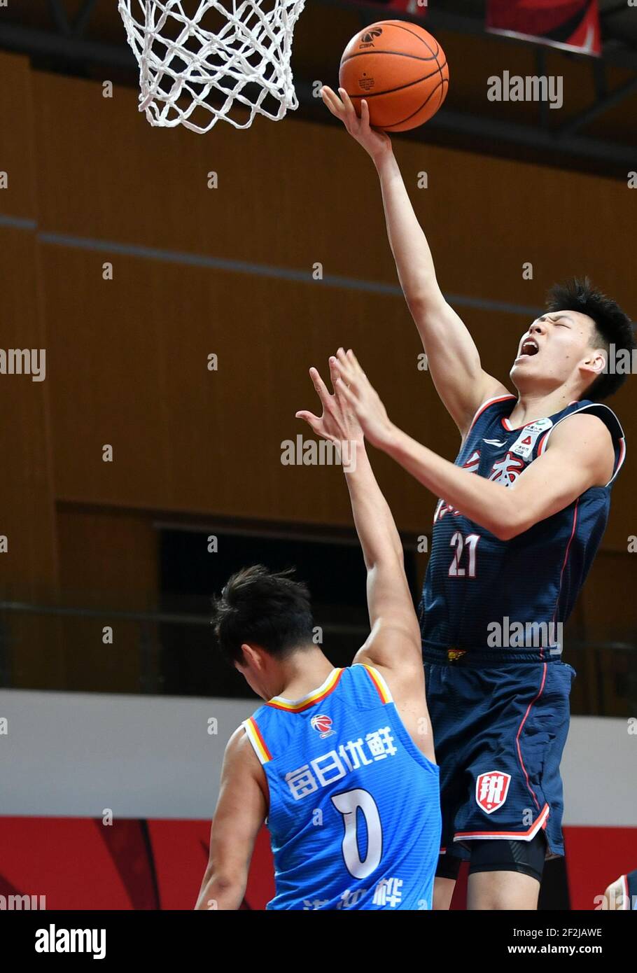 Zhuji, China's Zhejiang Province. 12th Mar, 2021. Zhang Hao (R) of ...